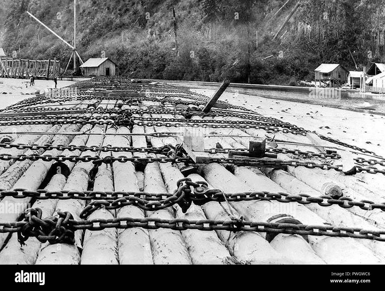 Built Benson log raft with chains Stock Photo - Alamy