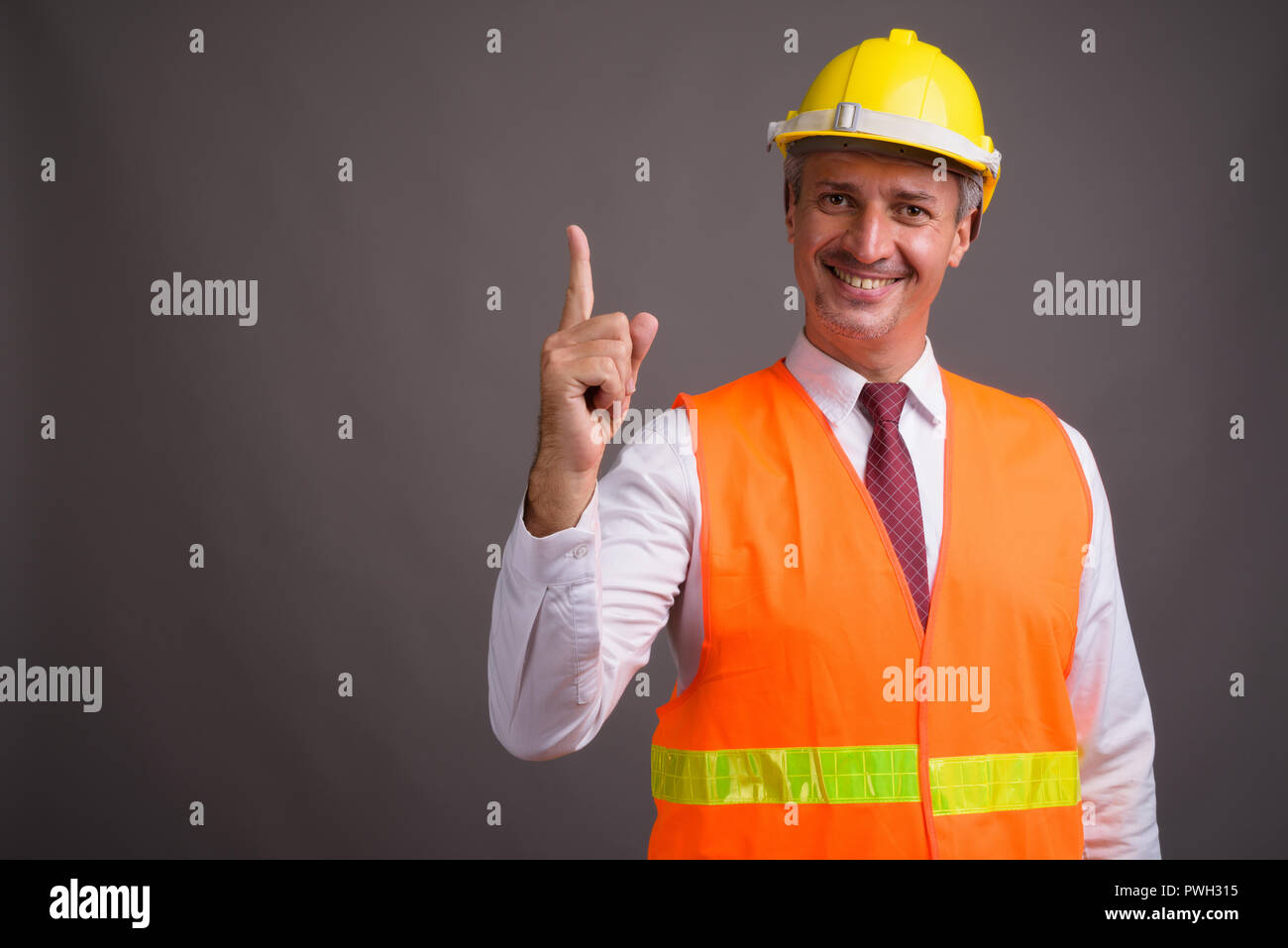 Construction worker pointing up hi-res stock photography and images - Alamy