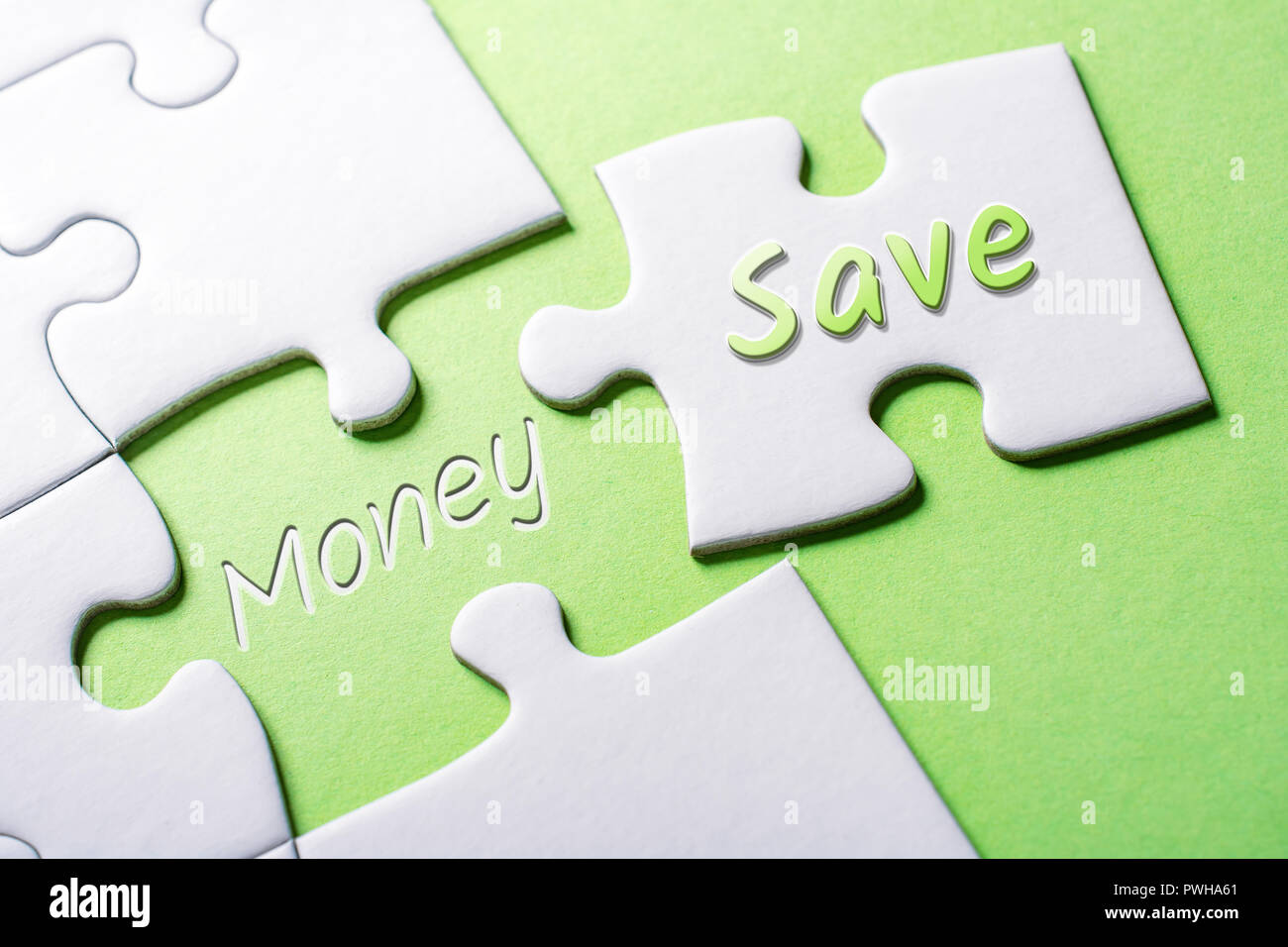 The Words Save And Money In Missing Piece Jigsaw Puzzle Stock Photo - Alamy