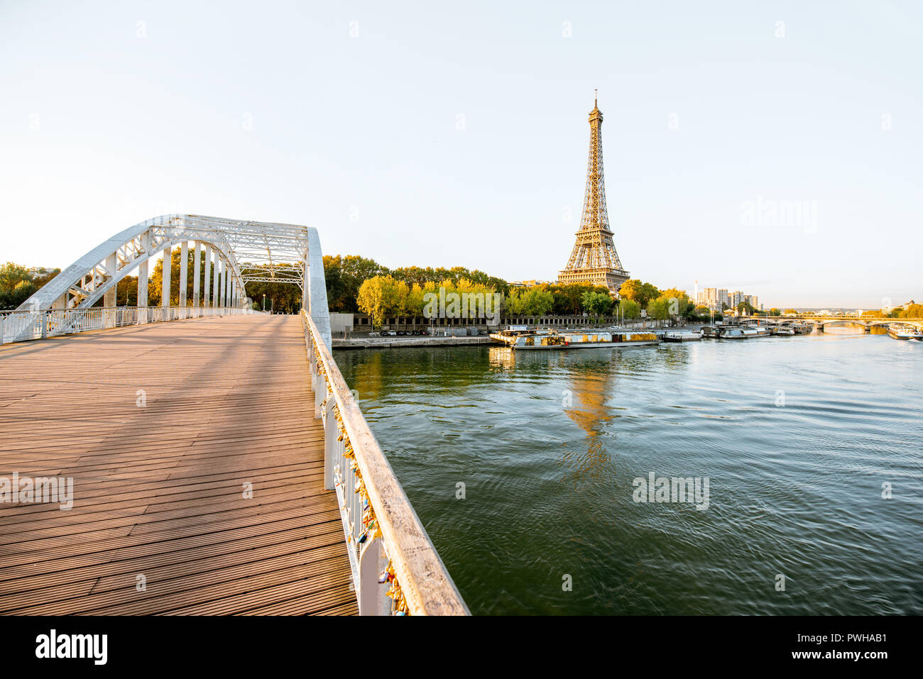 Landscape view of the riverside with Eiffel tower and bridge during the ...
