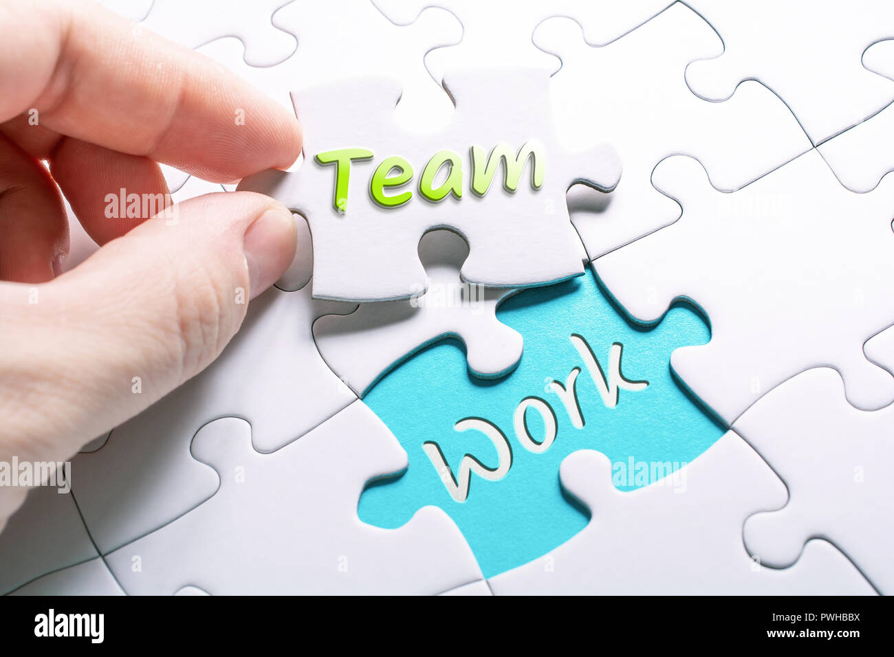 The Words Team And Work In Missing Piece Jigsaw Puzzle Stock Photo - Alamy