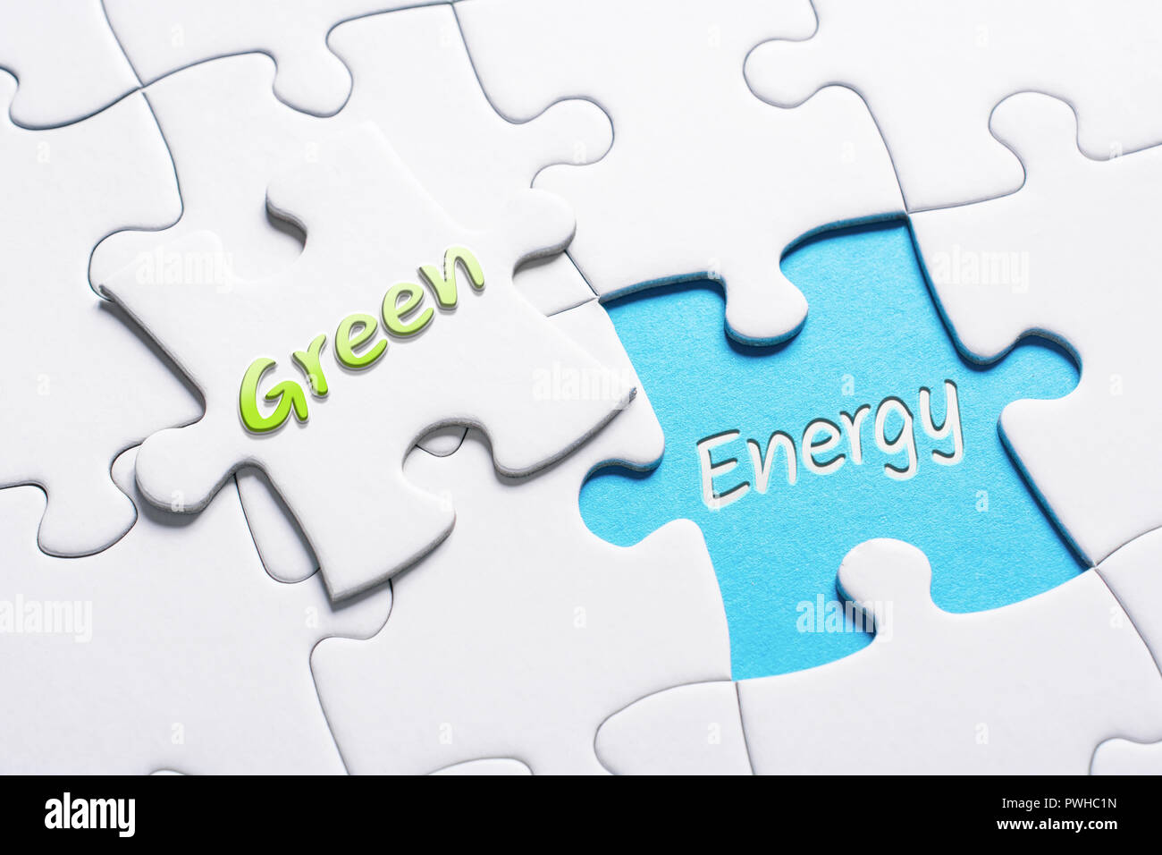 The Words Green And Energy In Missing Piece Jigsaw Puzzle Stock Photo ...