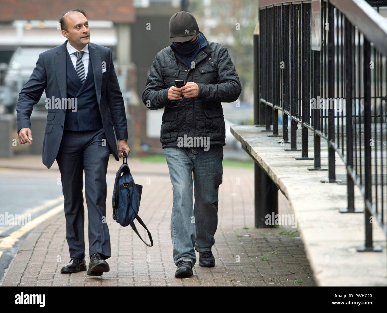 Edward Putman (right) arrives at St Albans Magistrates' Court, where he ...