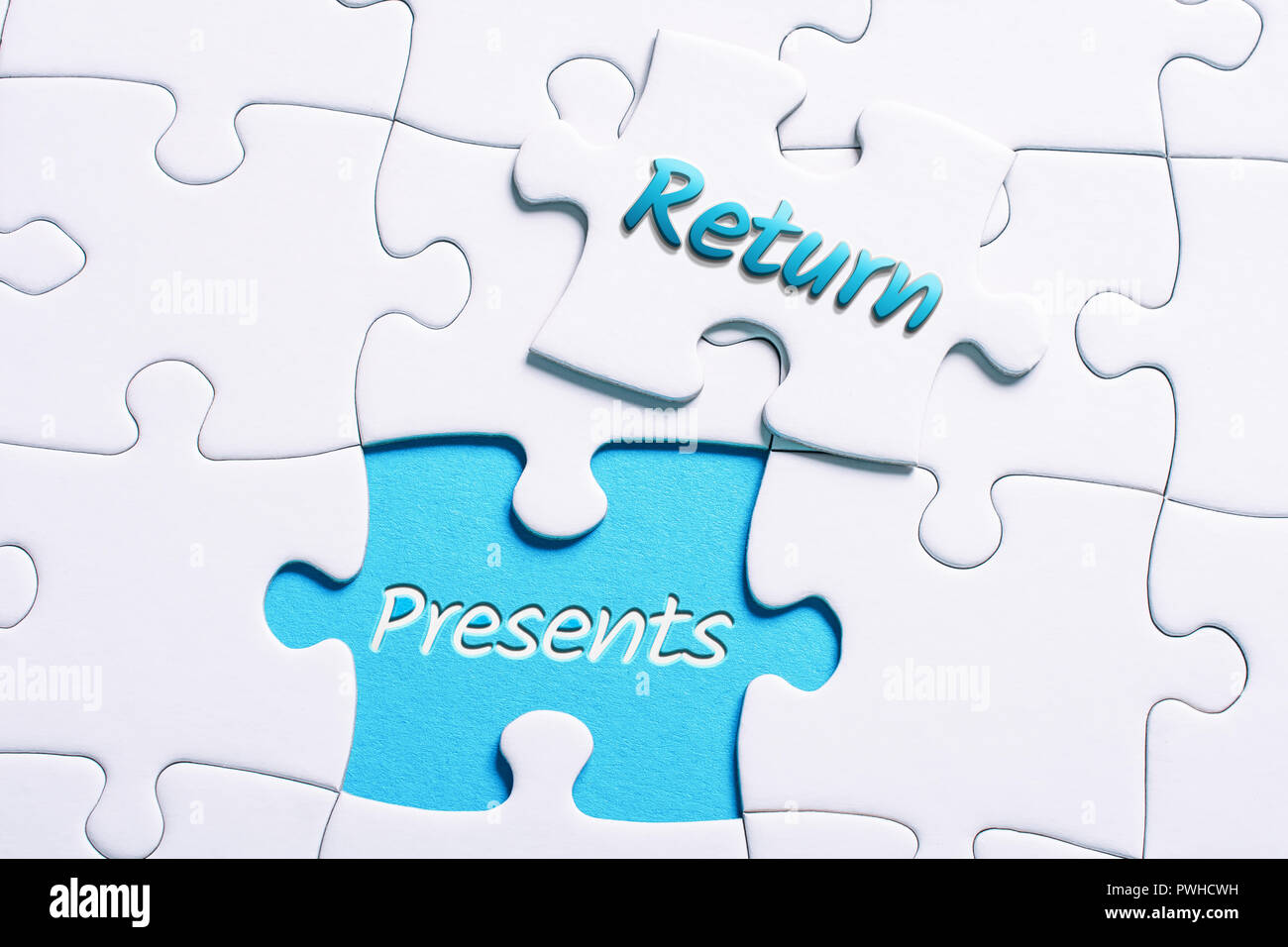 The Words Return And Presents In Missing Piece Jigsaw Puzzle Stock ...