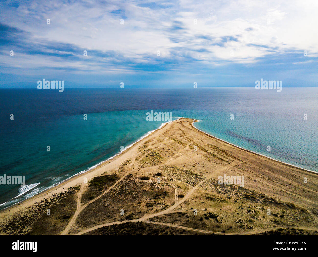 Triangle shaped beach leading into water aerial view Stock Photo - Alamy