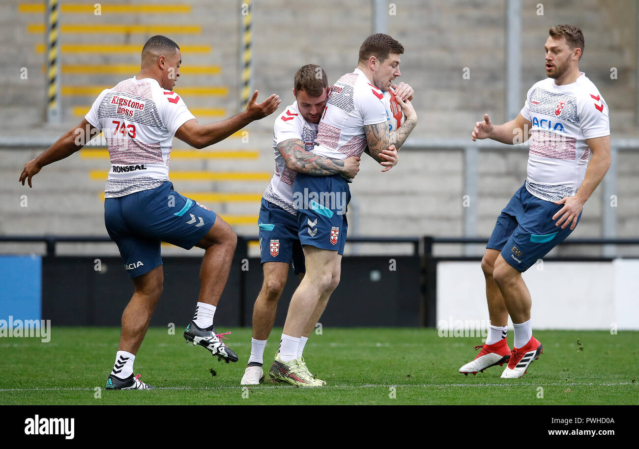 England's Mark Percival is tackled by Richie Myler, during the England ...