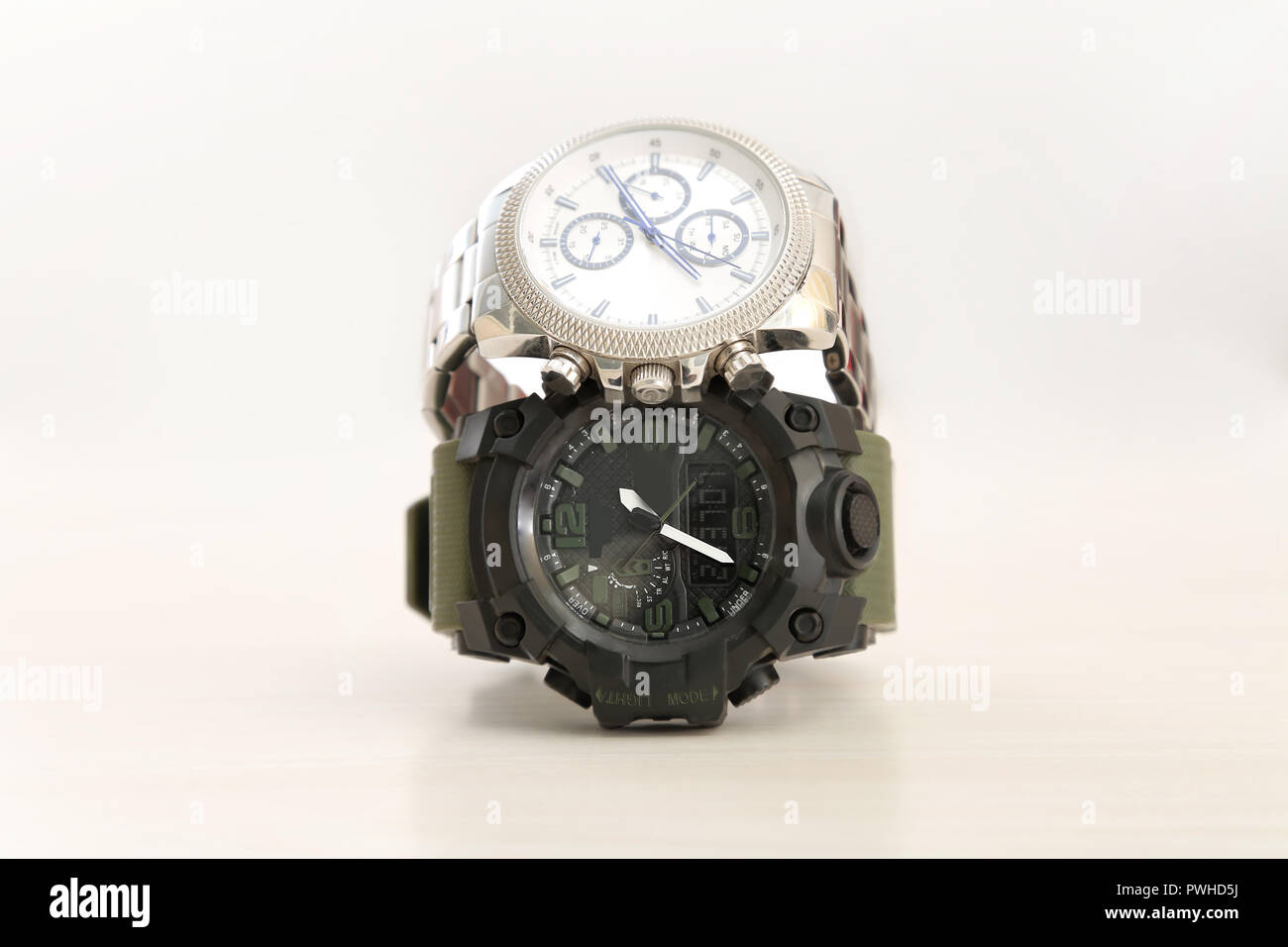 Picture of two wrist watch on white background Stock Photo - Alamy