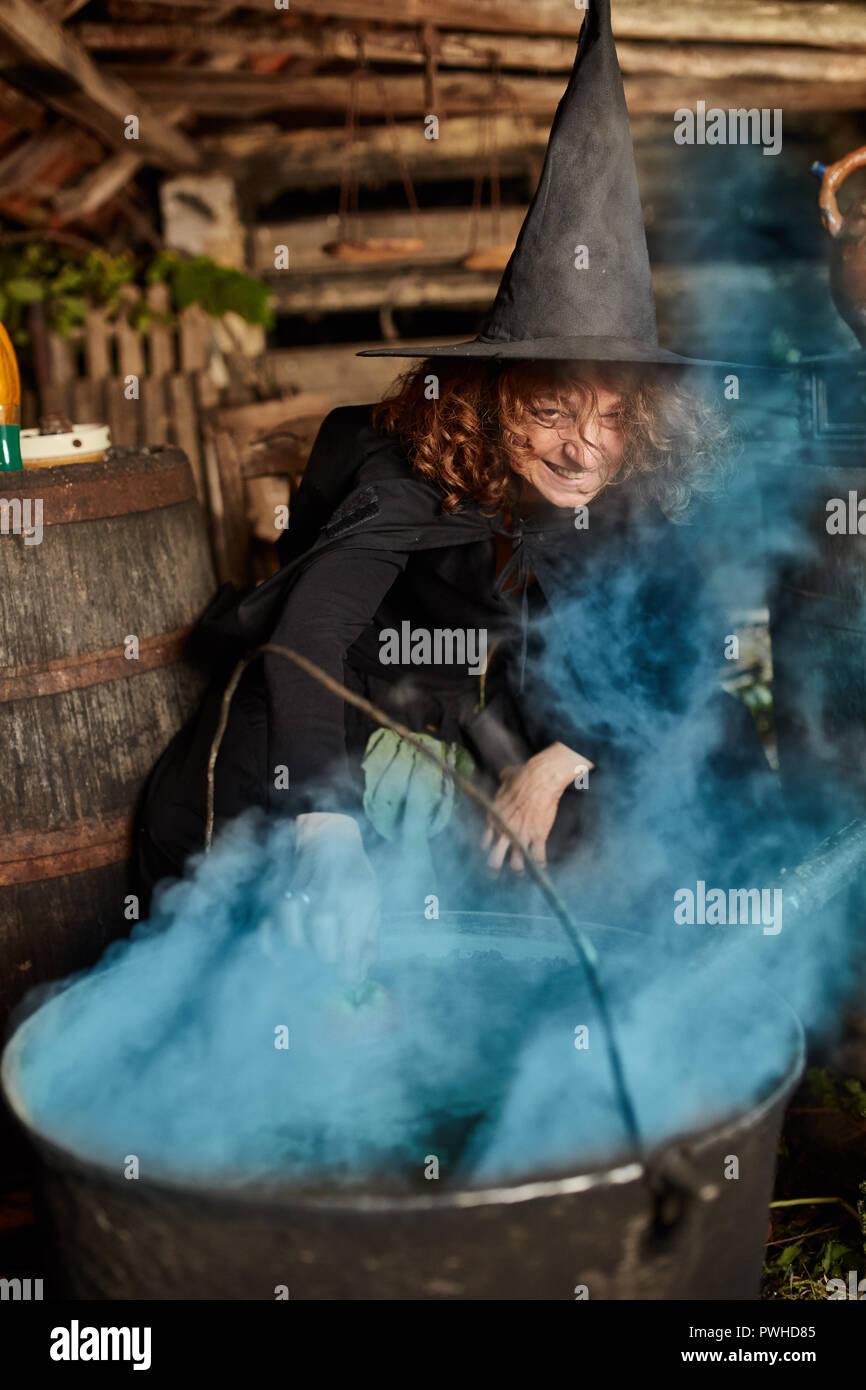 Figure wearing a cloak hi-res stock photography and images - Alamy