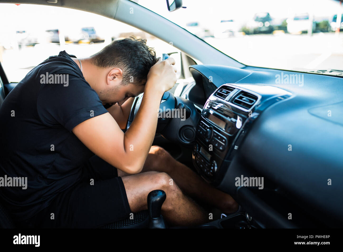 Closeup portrait tired young handsome man with short attention span ...
