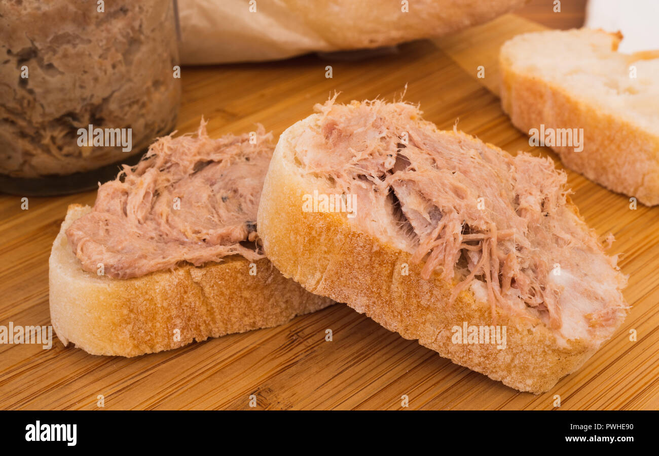 Two Homemade Rillettes French meat spread made of pork on a baguette ...