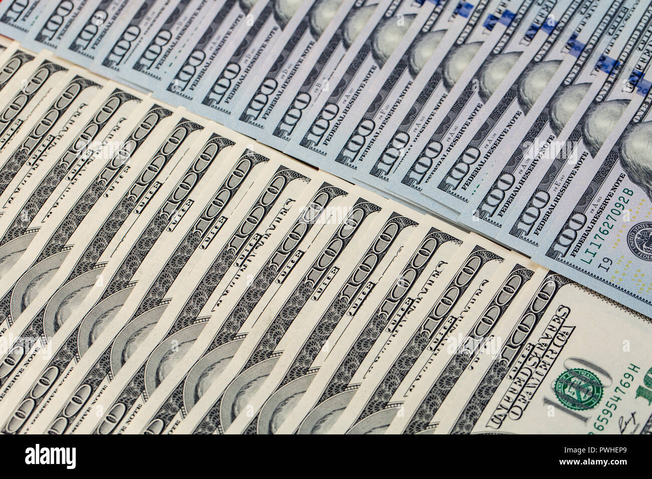 a pile of American paper hundred-dollar bills as an element of the ...