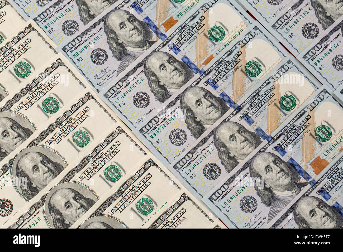 a pile of American paper hundred-dollar bills as an element of the ...