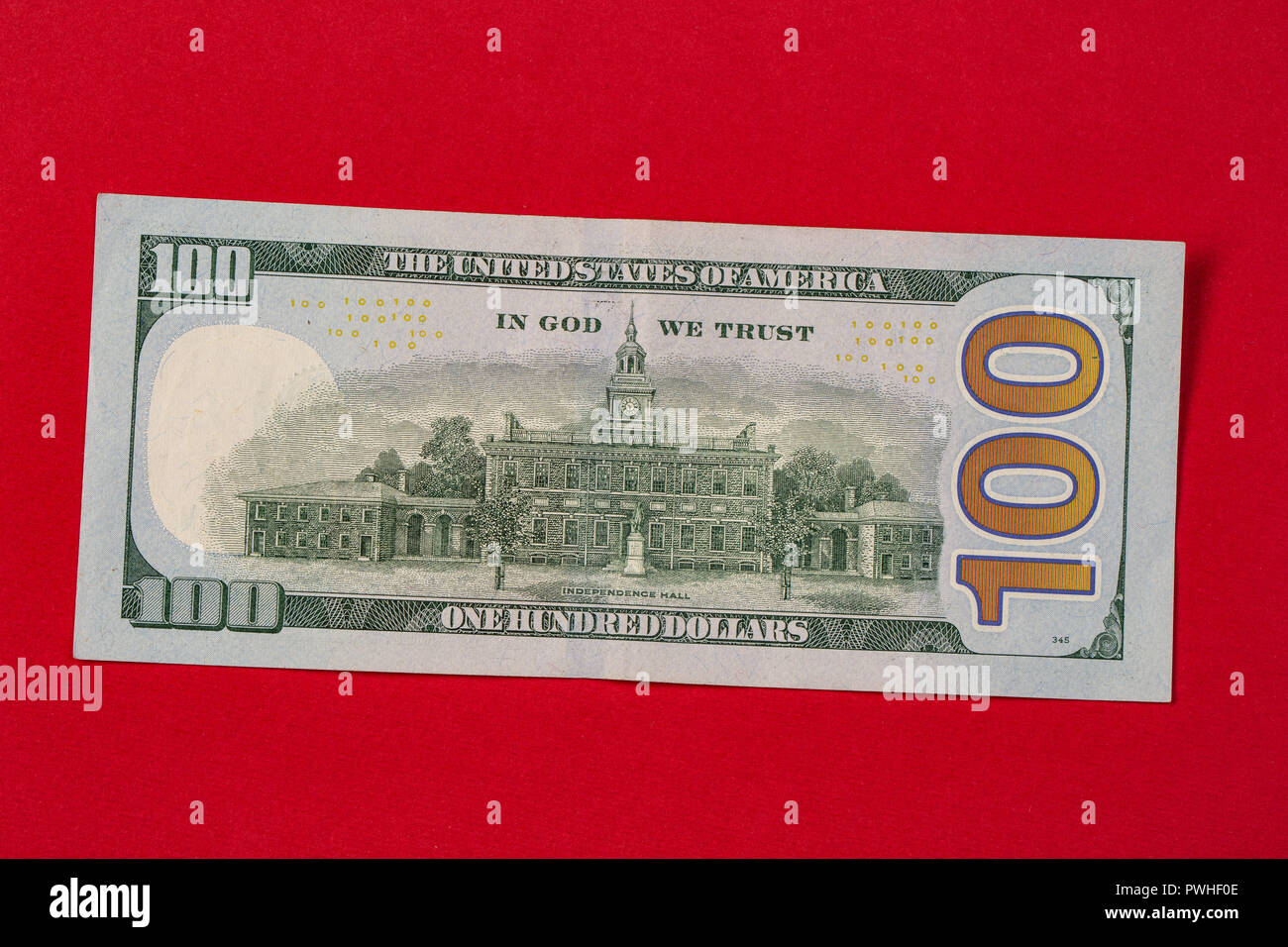 Independence Hall on a new edition hundred dollar bill on red ...