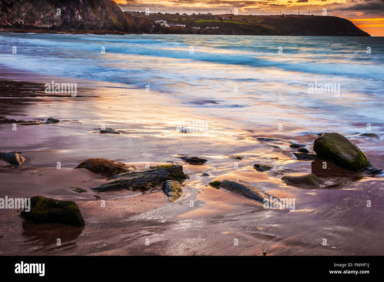 Sunset wet boulders hi-res stock photography and images - Alamy