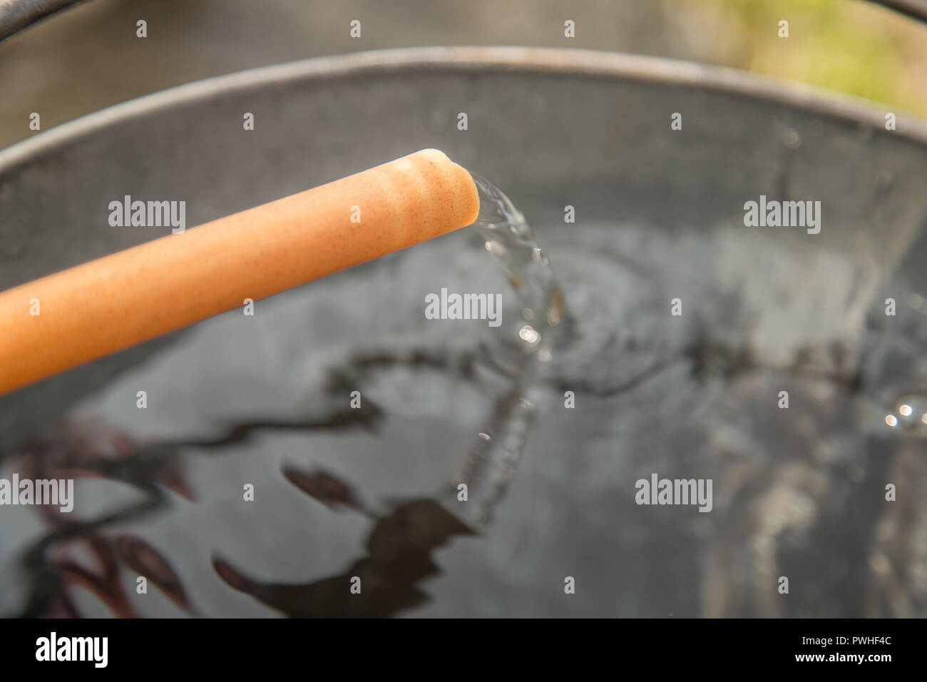 Leaking bucket hi-res stock photography and images - Alamy