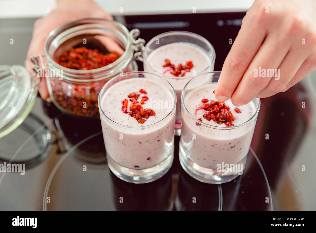 Adding Toppings High Resolution Stock Photography and Images - Alamy