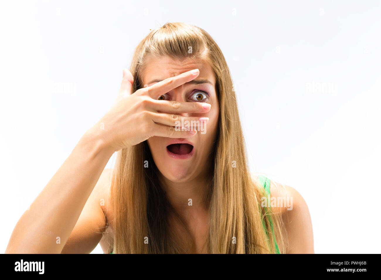 Portrait of afraid young woman Stock Photo - Alamy