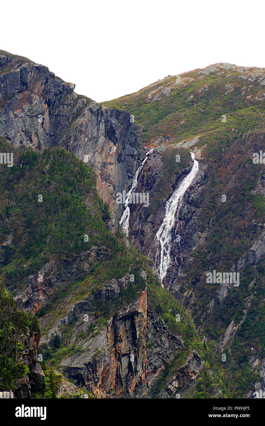 Water falls in Western Brook Pond, Gros Morne National Park ...