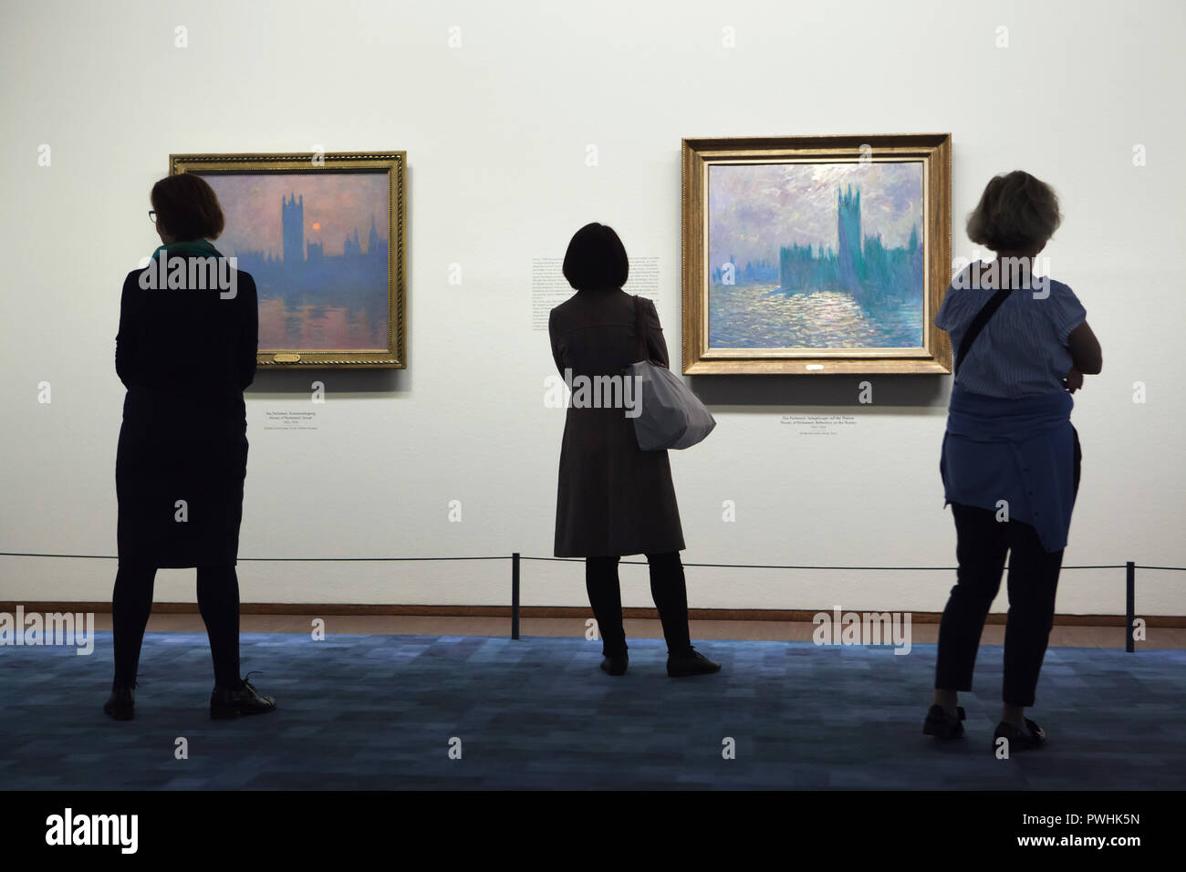 Visitors in front of the paintings by French Impressionist painter ...