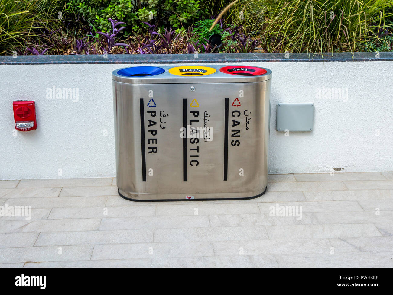 Segregated garbage bin on footpath Stock Photo - Alamy