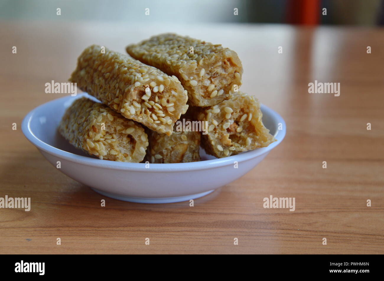 sesame roll Chinese traditional snack on cup Stock Photo - Alamy