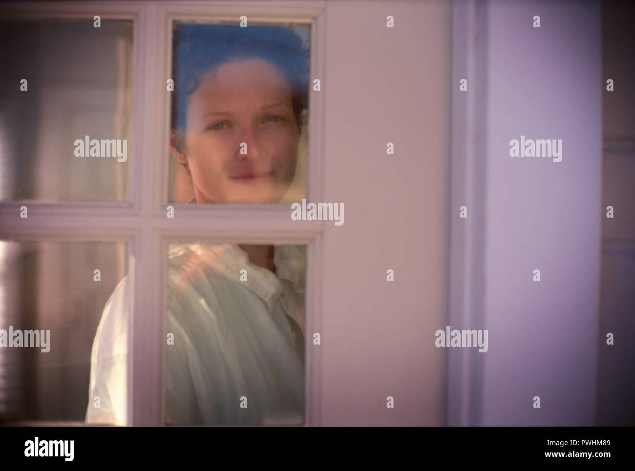 Person viewed through a window hi-res stock photography and images - Alamy