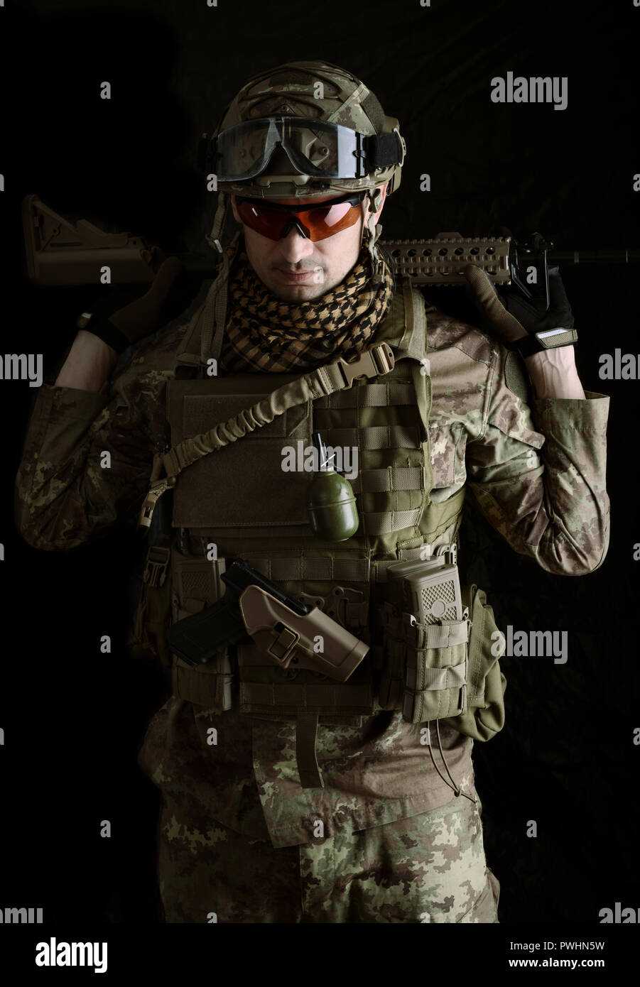 close up portrait of handsome military man. Macro shot on black ...