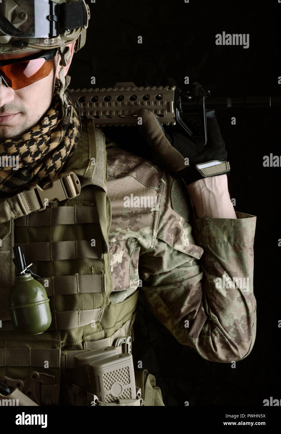 close up portrait of handsome military man. Macro shot on black ...