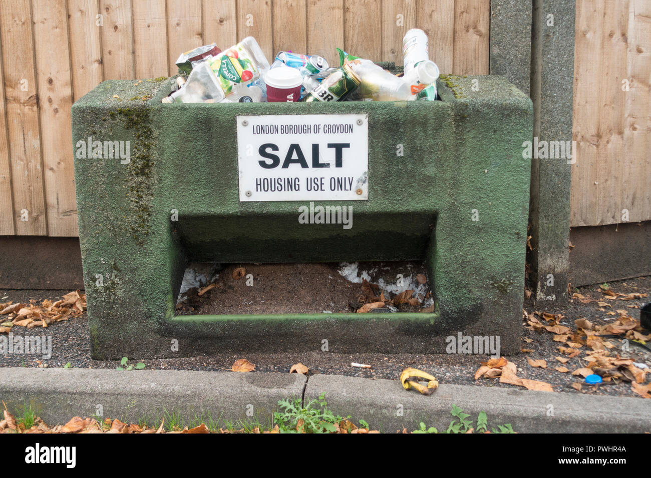 A salt container overflowing with trash Stock Photo - Alamy