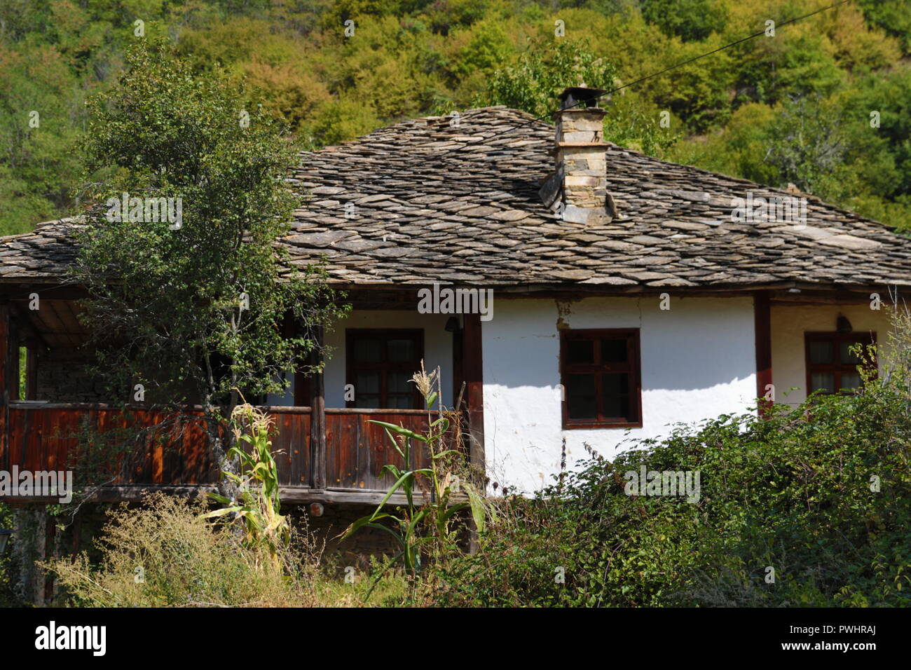 Stone house with stone fence in the Village of Leshten. Historical ...