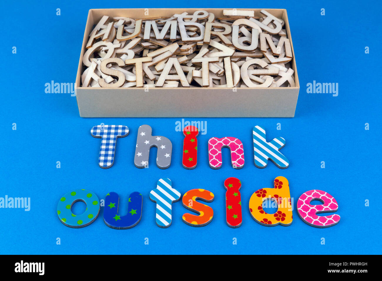 Think outside the box with a box full off dull mixed letters saying ...