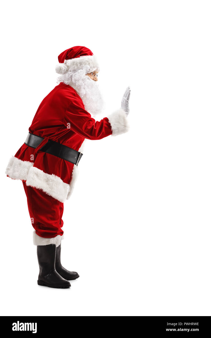 Full length profile shot of Santa Claus waving isolated on white ...