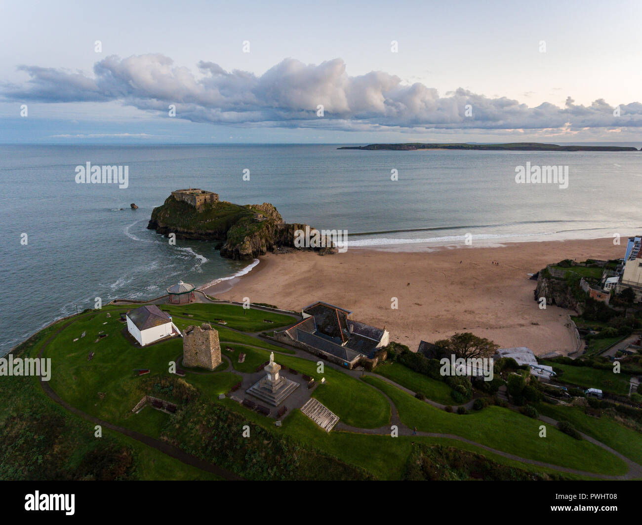 Aerial view of beach and coastal town at dawn hi-res stock photography ...