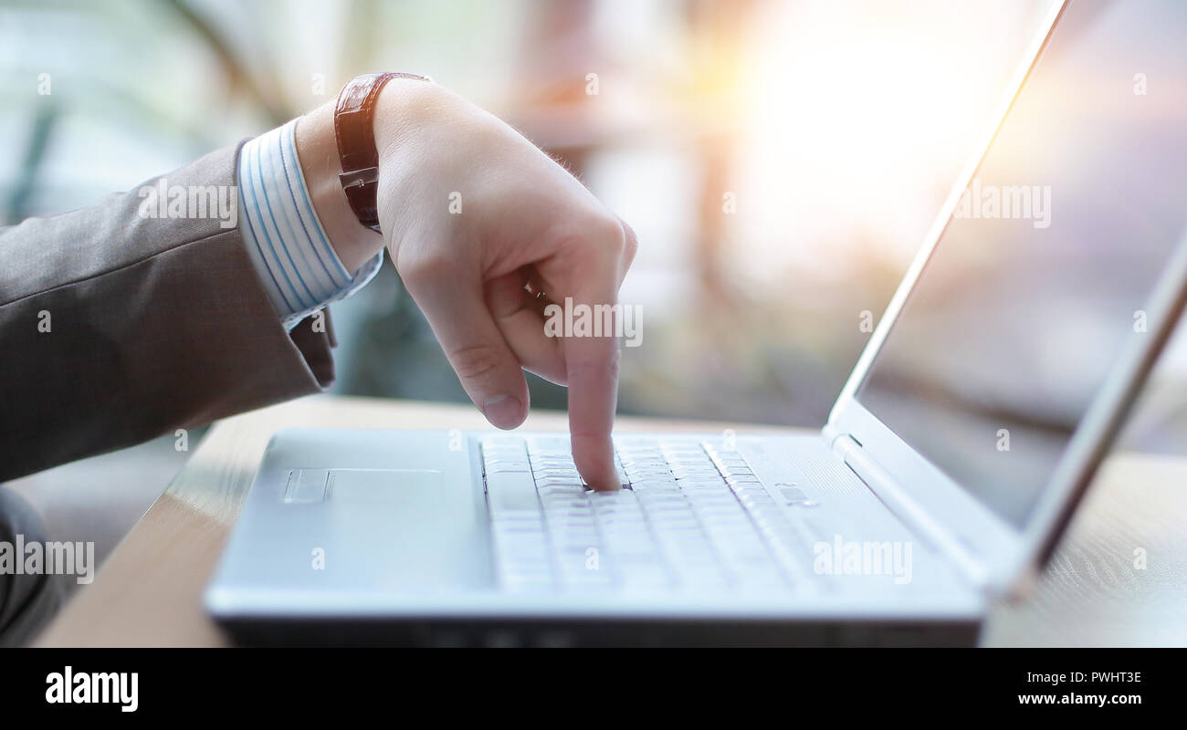 Male hands using and pointing laptop Stock Photo - Alamy