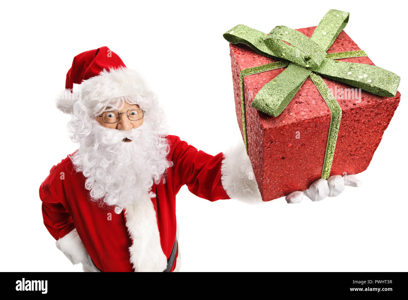 Santa holding present hi-res stock photography and images - Alamy