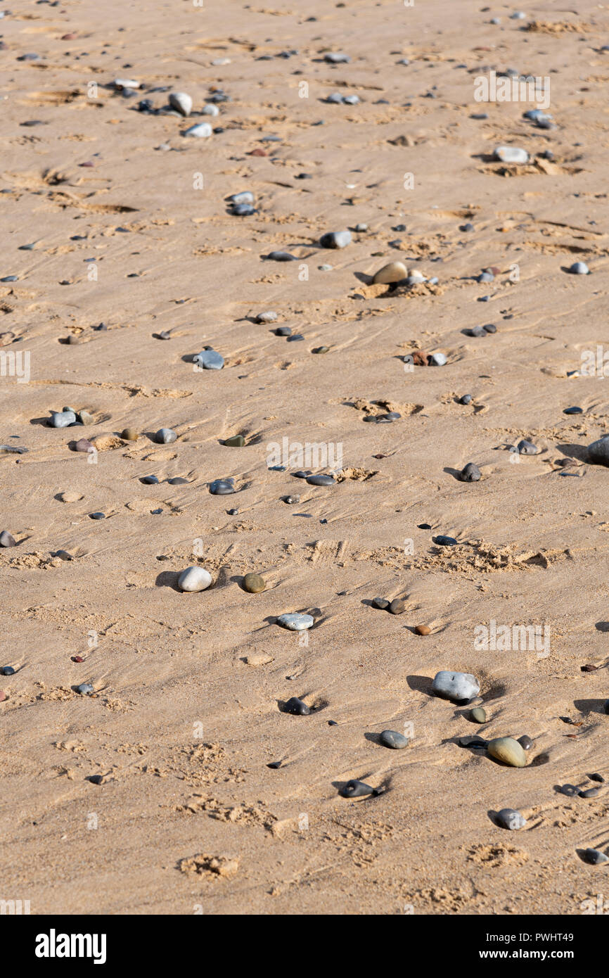Pebbles in the Sand Texture Stock Photo - Alamy