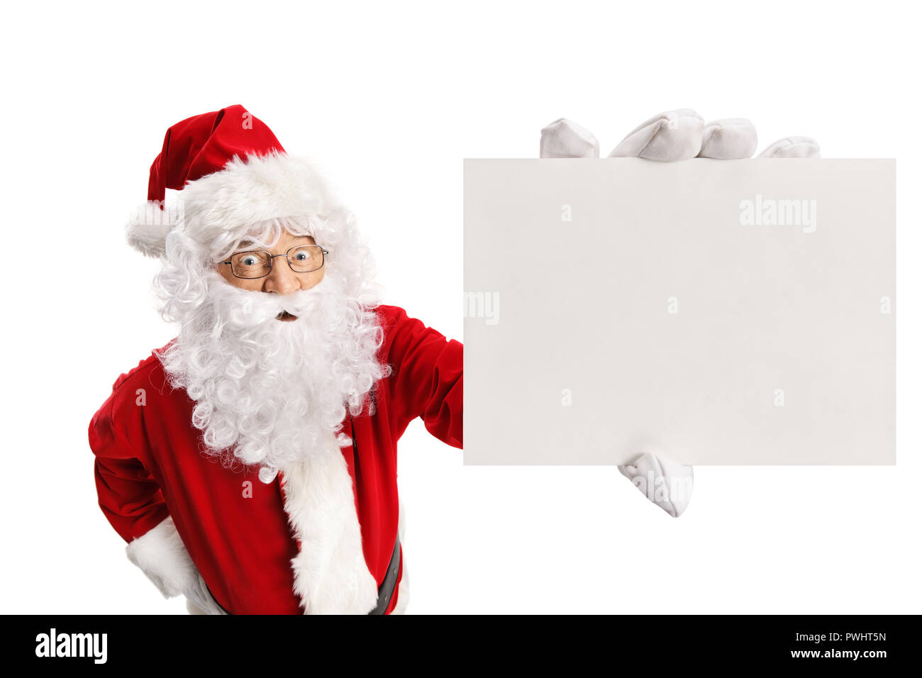Surprised Santa Claus holding a blank card isolated on white background ...