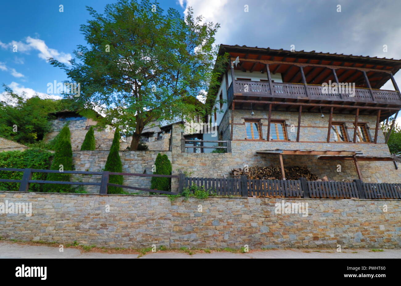 Stone house with stone fence in the Village of Leshten. Historical ...