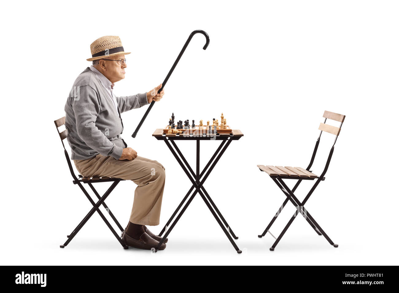 Angry mature man playing chess isolated on white background Stock Photo ...