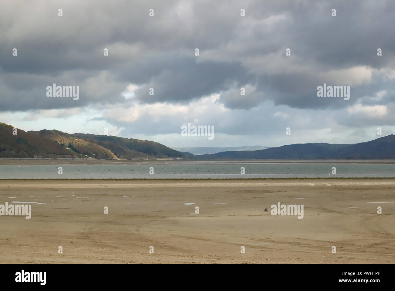 View over Ynyslas beach estuary towards Snowdonia. Dyfi estuary ...