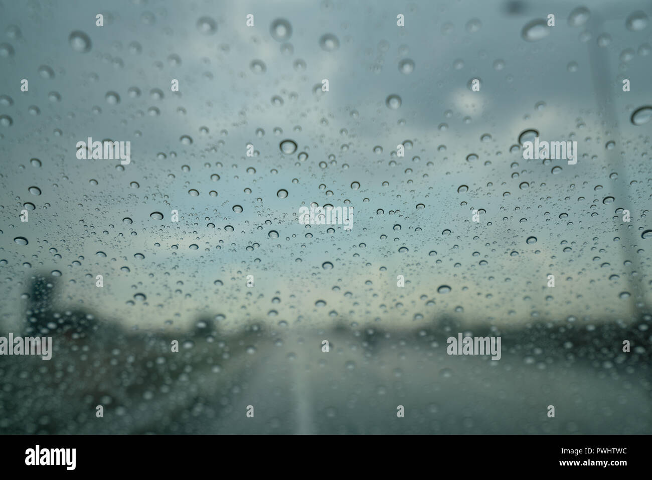 raindrop on glass car texture background Stock Photo - Alamy