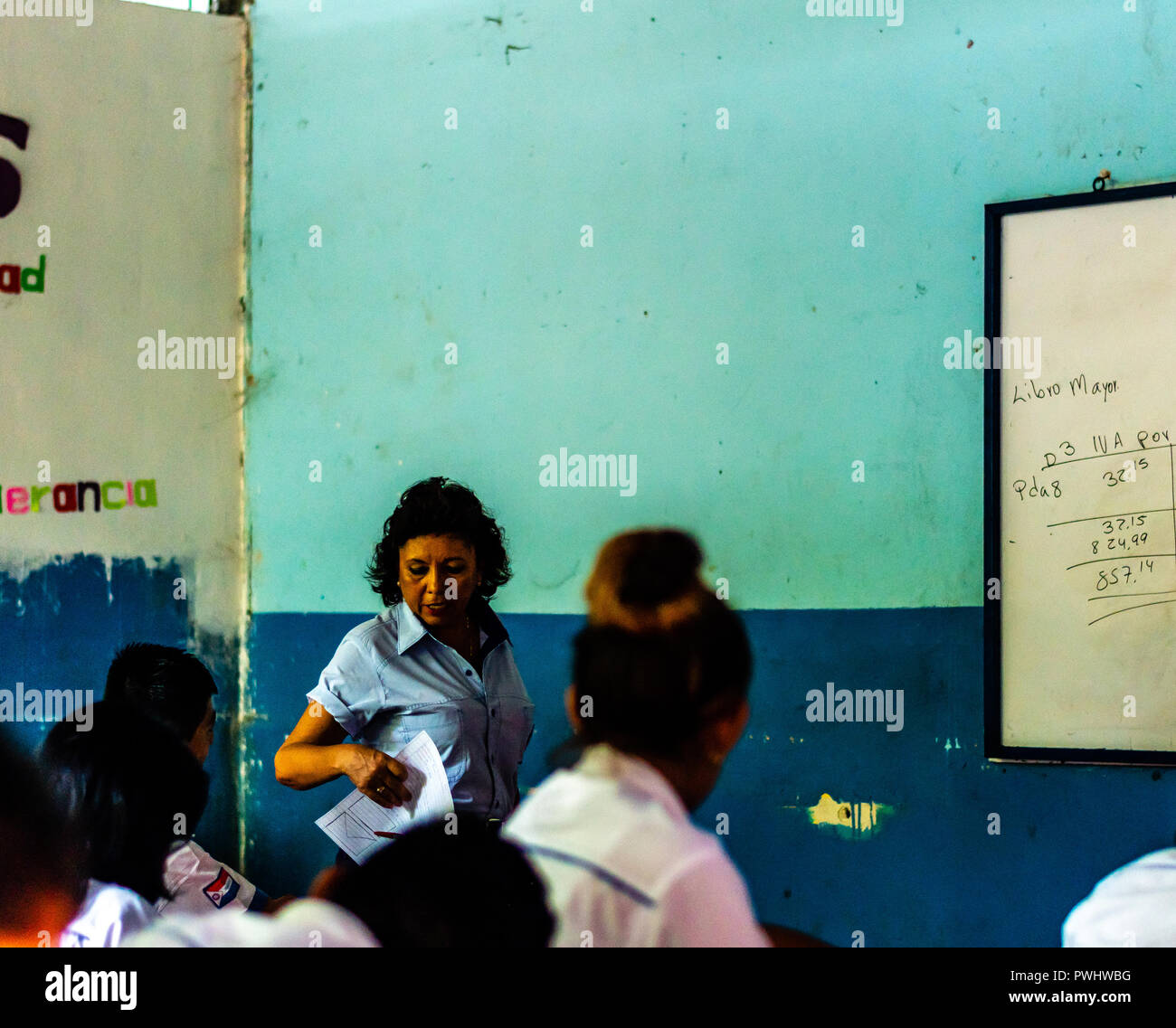 teacher helping class at guatemalan Stock Photo - Alamy