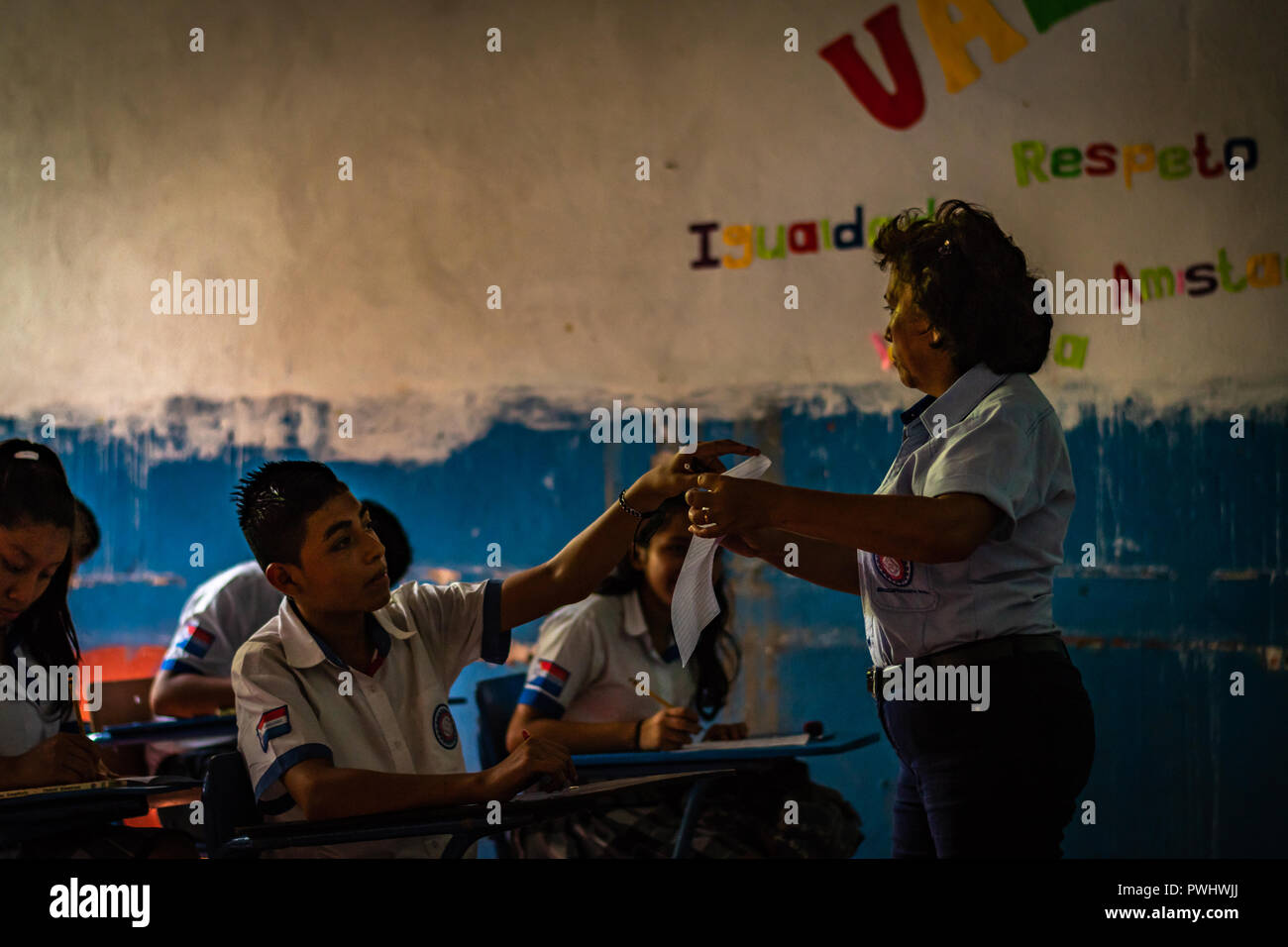 teacher helping class at guatemalan Stock Photo - Alamy