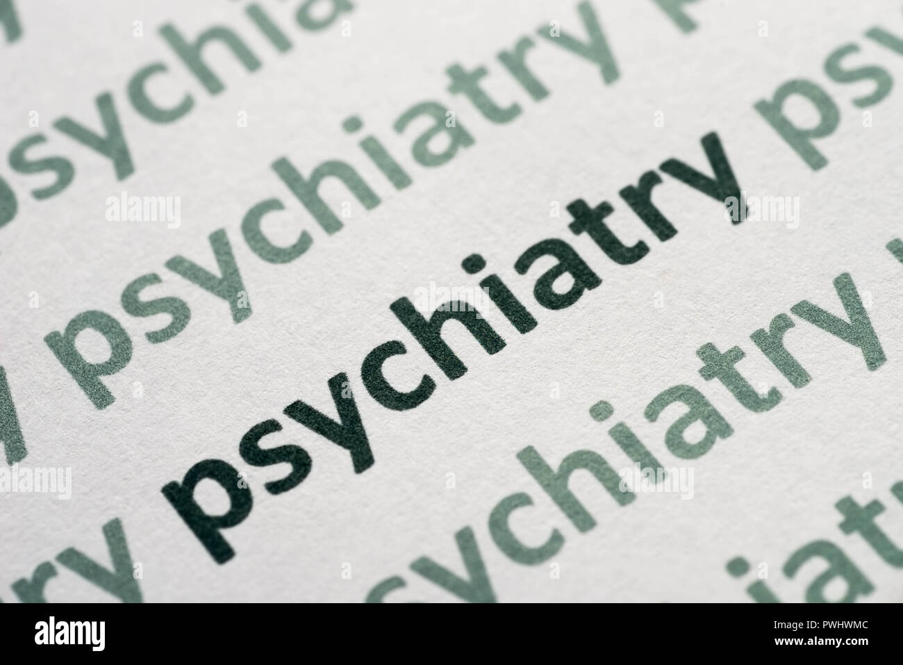word psychiatry printed on whte paper macro Stock Photo - Alamy