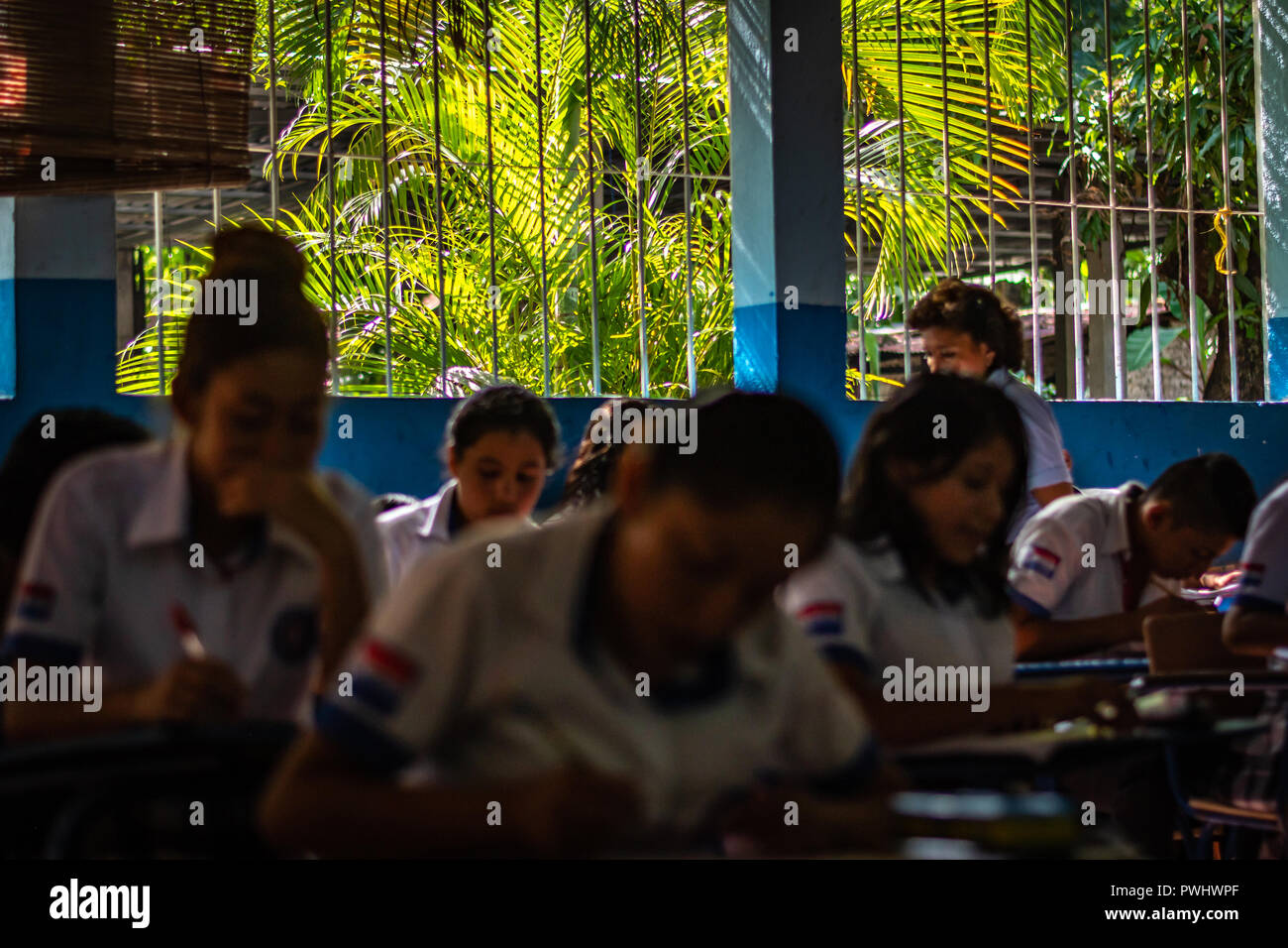 teacher helping class at guatemalan Stock Photo - Alamy