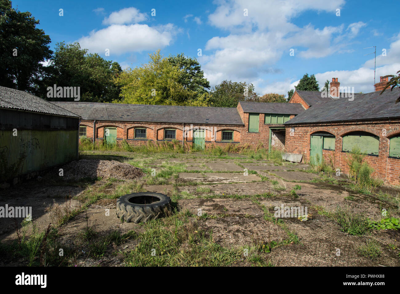 Old lorry Tyre in Delapre Abbey stables Northampton UK Stock Photo - Alamy