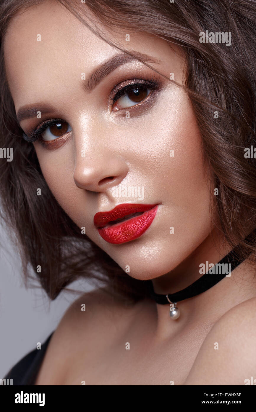 Beautiful girl with classic make up. Beauty face Stock Photo - Alamy