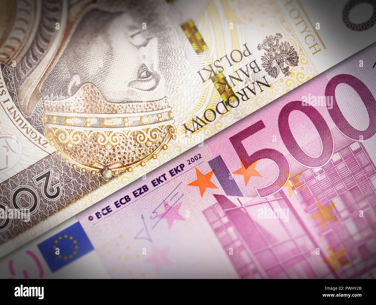 Two money bills aligned and setup next to each other symbolizing ...