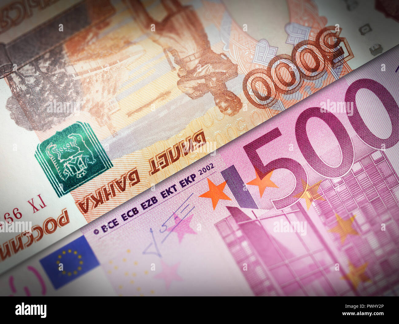 Two money bills aligned and setup next to each other symbolizing ...