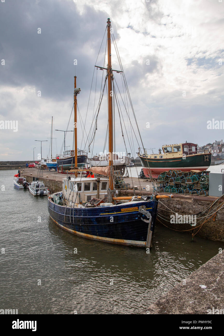 Fishing boats in the harbour at St Monans, Fife, Scotland Stock Photo ...
